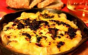 Melted fontina cheese with sundried tomatoes - Westmount Magazine
